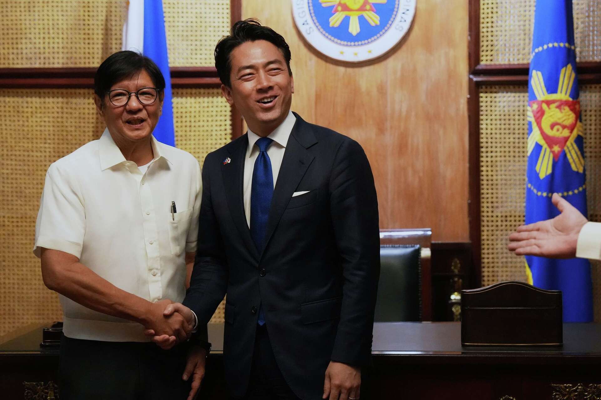 Japan and Philippines agree to weapons pact talks as China’s ‘coercive ...