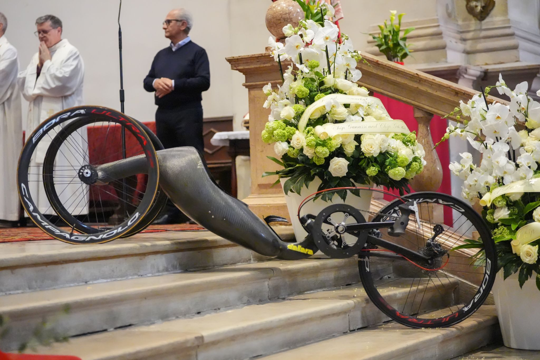 Thousands at funeral for Italian auto champ and Paralympic gold ...