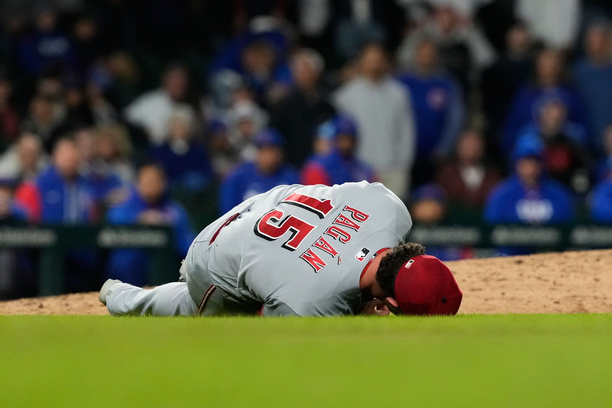 Reds closer Emilio Pagán carted off with an apparent left hamstring ...