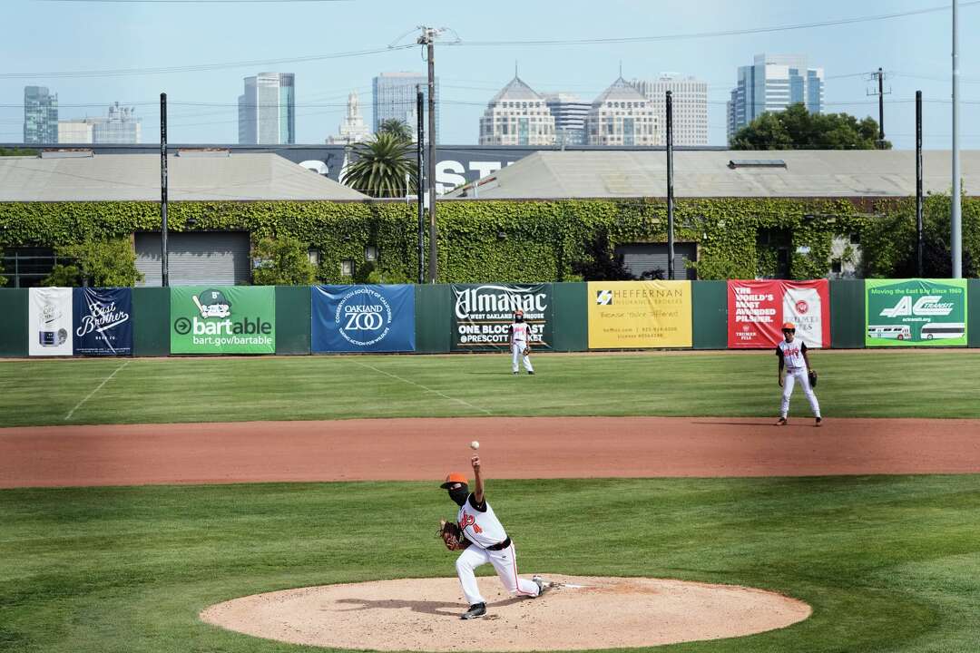 The Oakland high school that produced Frank Robinson and others fights ...