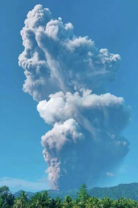 Indonesian rescuers find 1 body after volcano eruption as search ...