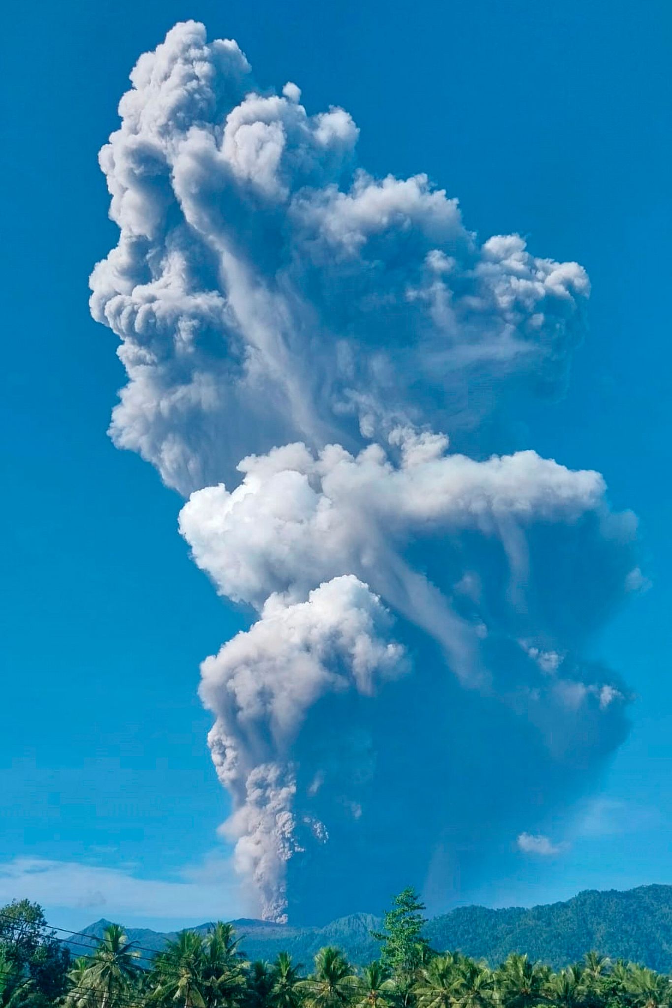 Volcanic eruption on a remote Indonesian island kills 3 hikers