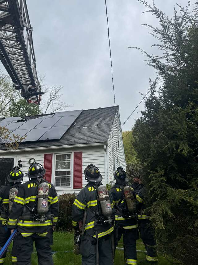 Elderly resident rescued from Waterbury solar panel fire, crew says