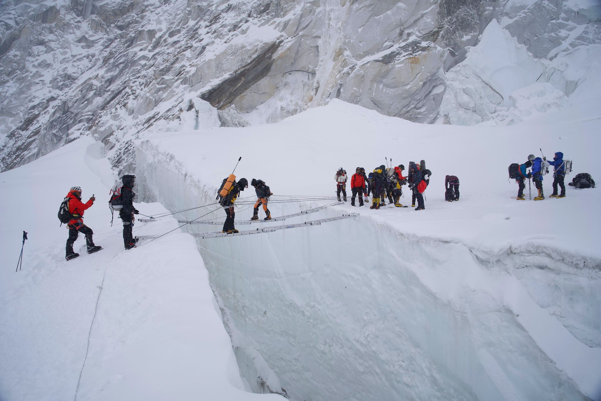 Sherpa guide missing for a week on Mount Everest rescued while crawling ...