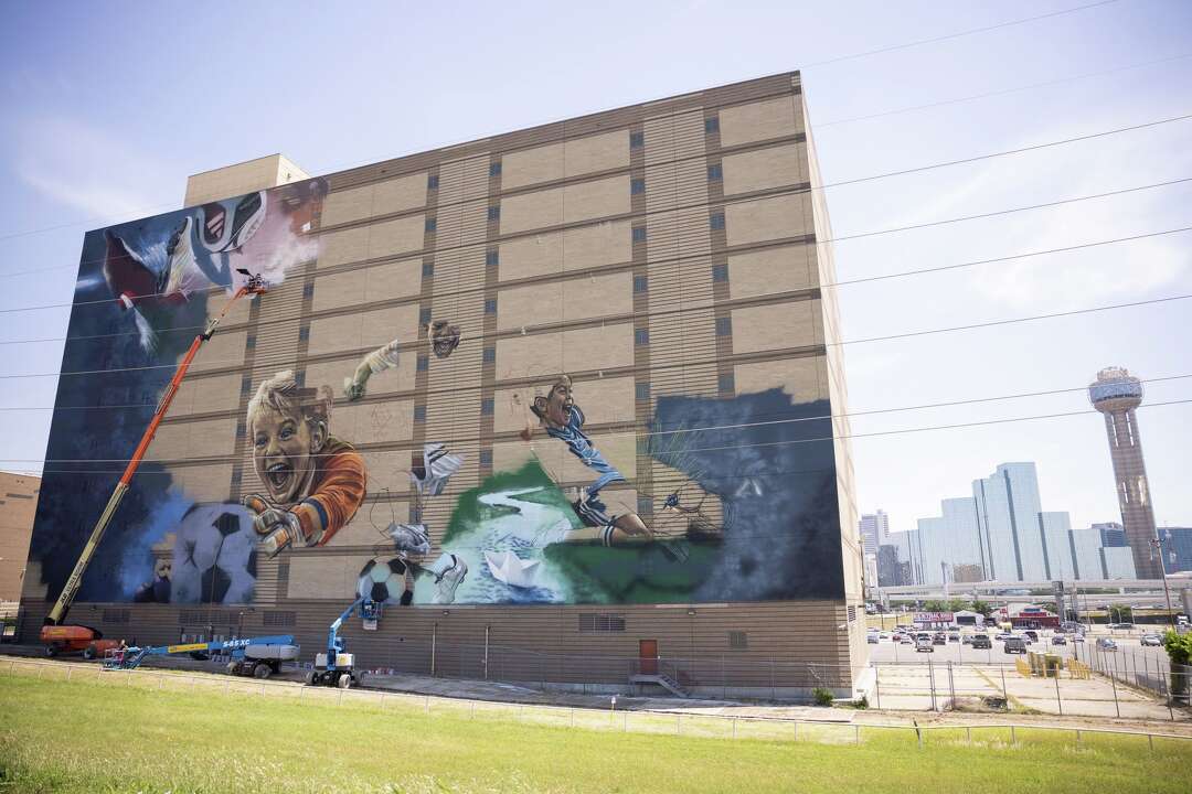 ‘One Field, Infinite Smiles’: Artists work on Dallas World Cup mural
