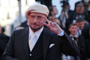 John Travolta surprised with honorary Palme d'Or at Cannes Film Festival