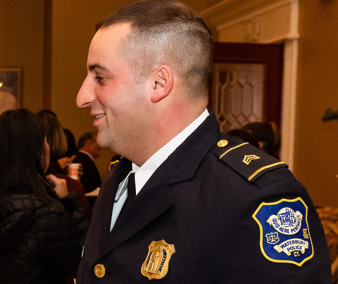 Waterbury cop's arraignment on assault charge continued
