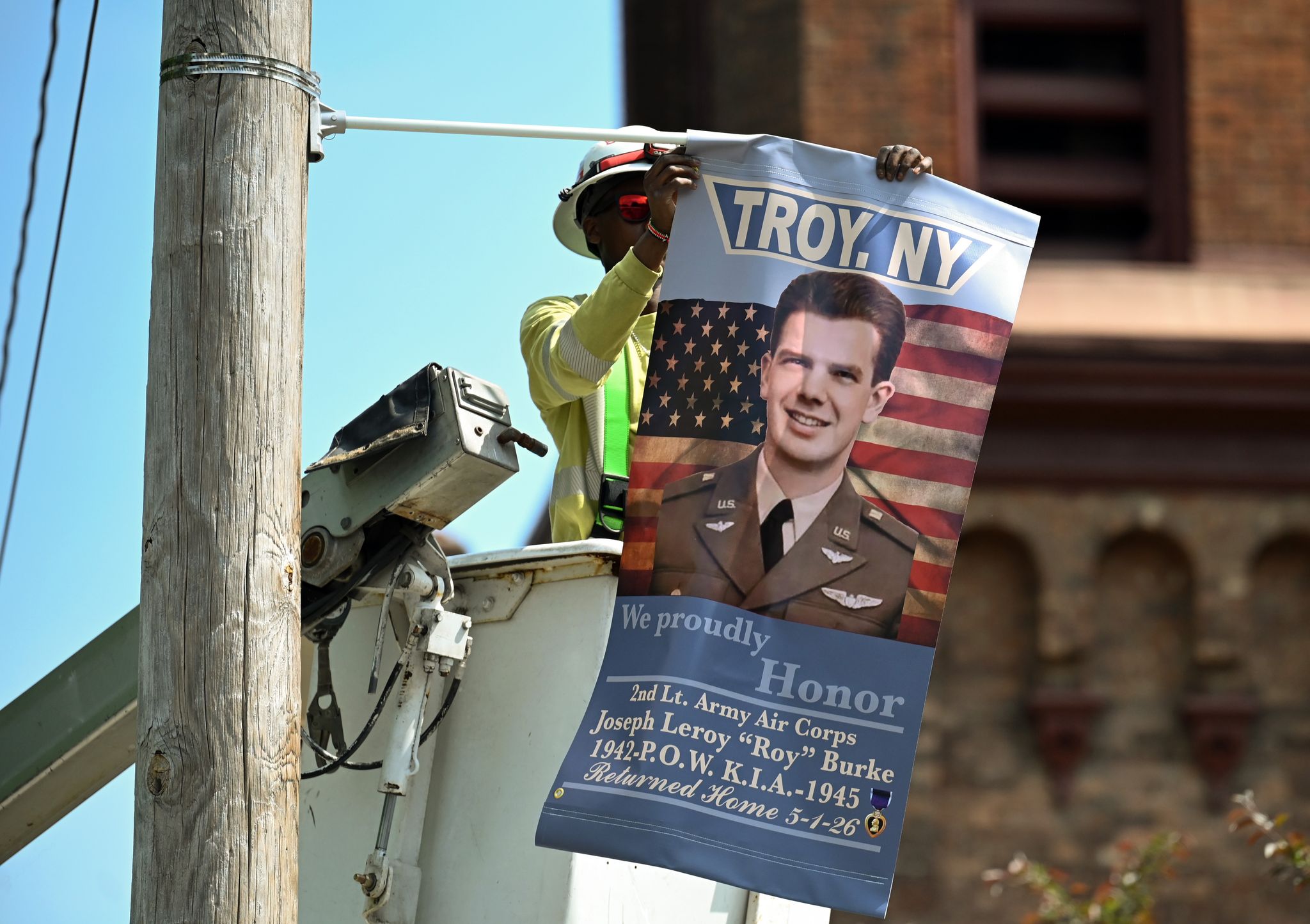 Photos: Troy banner honors airman lost in World War II