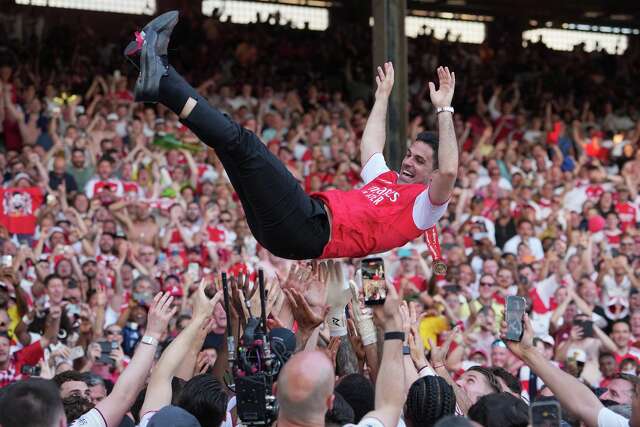 Kroenkes enjoy 'magical' title win as Arsenal's players finally get ...