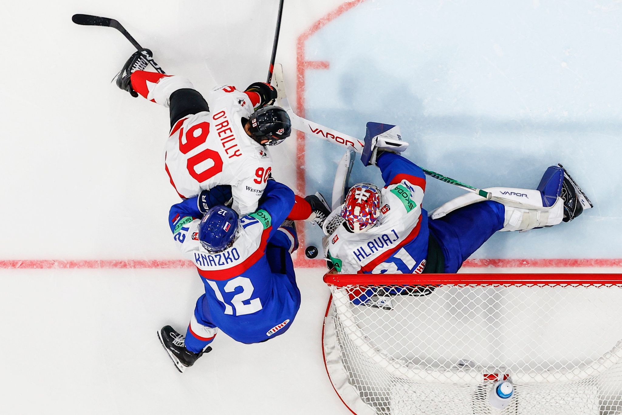 Canada scores 4 in the final period to beat Slovakia 5-1 at ice hockey ...