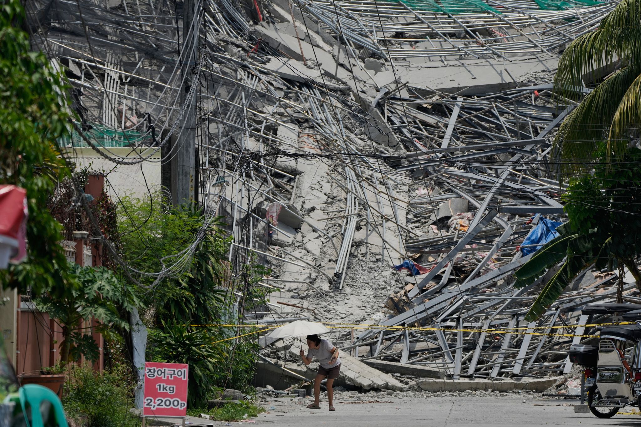 Photos show the aftermath of a building collapse in the Philippines