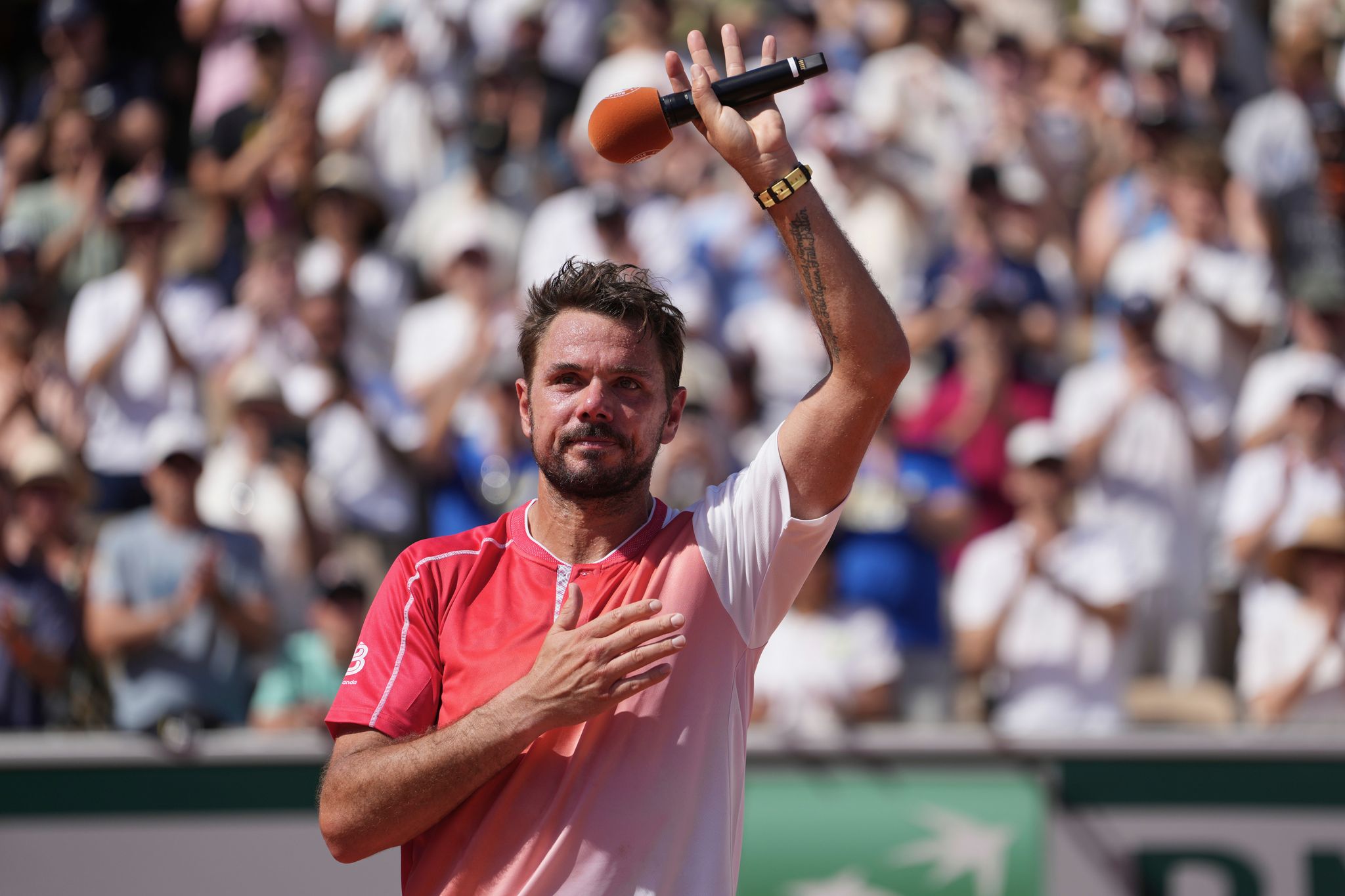 Wawrinka waves emotional goodbye to French Open after losing in first round