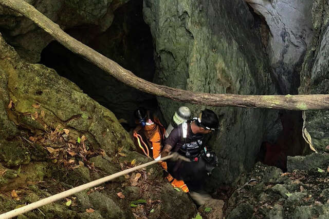 Rescuers search for alternative route to reach 2 missing in a flooded ...