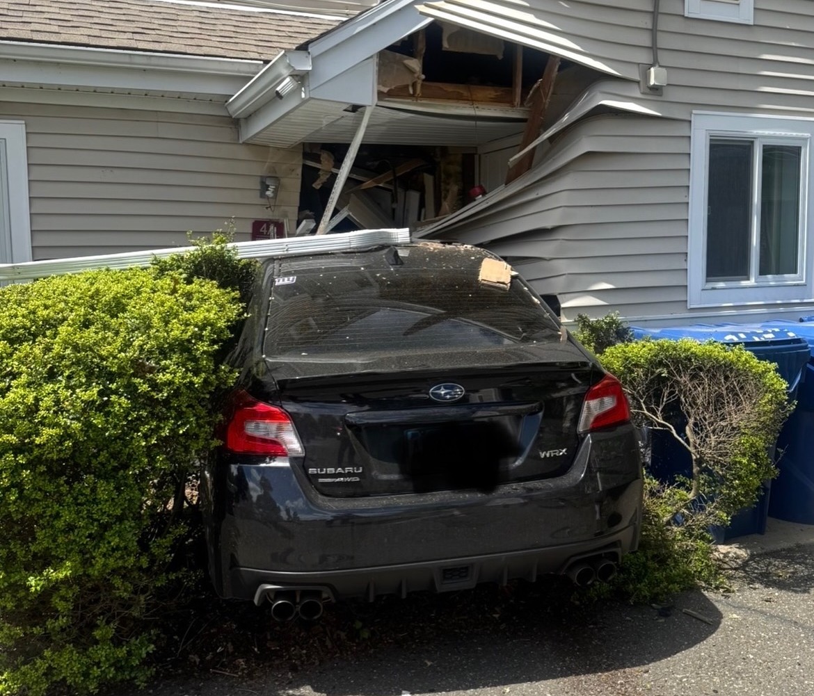 1 sent to hospital after car crashes into Westport building: Officials