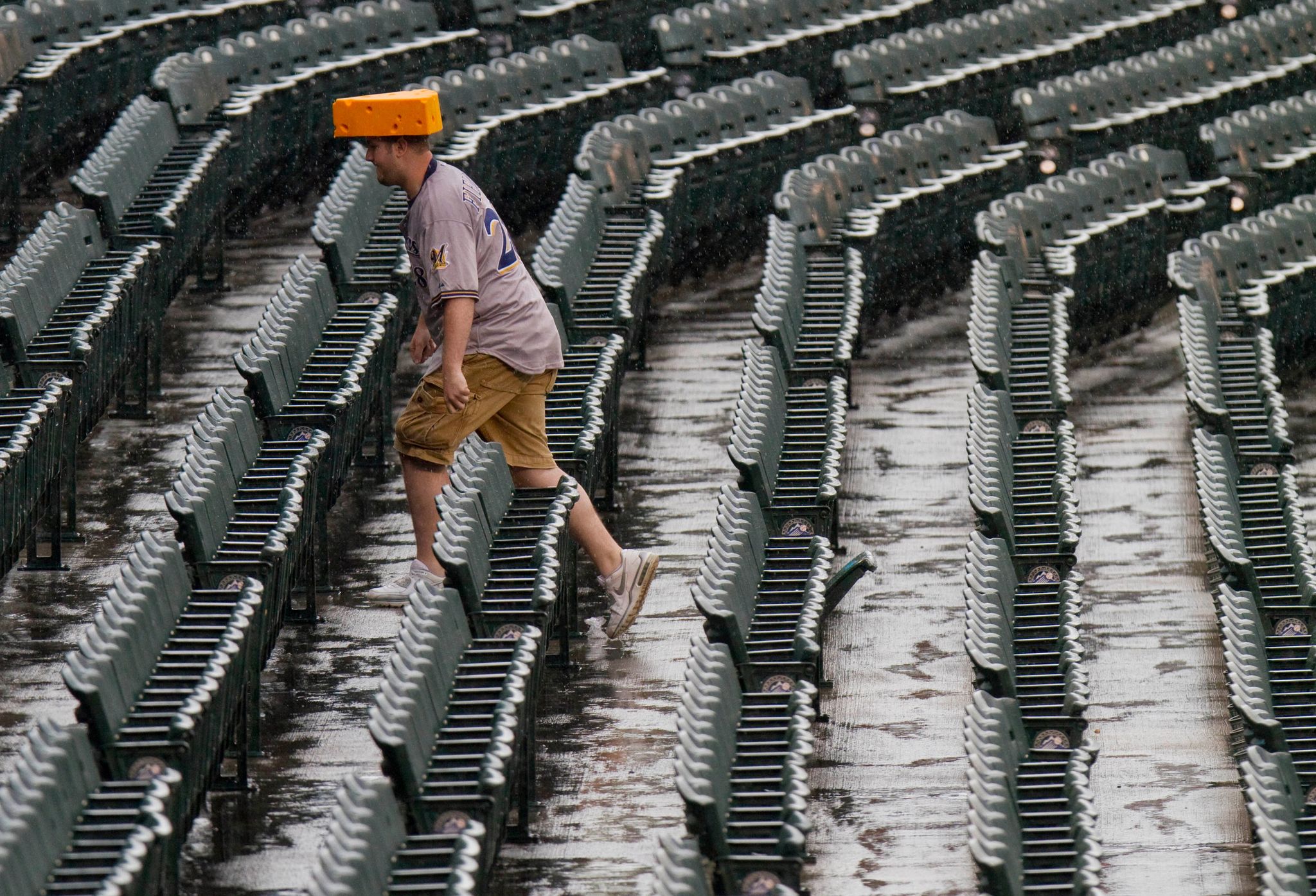 The cheesehead hat is a sunny nod to America's 'Hold my beer' exuberance