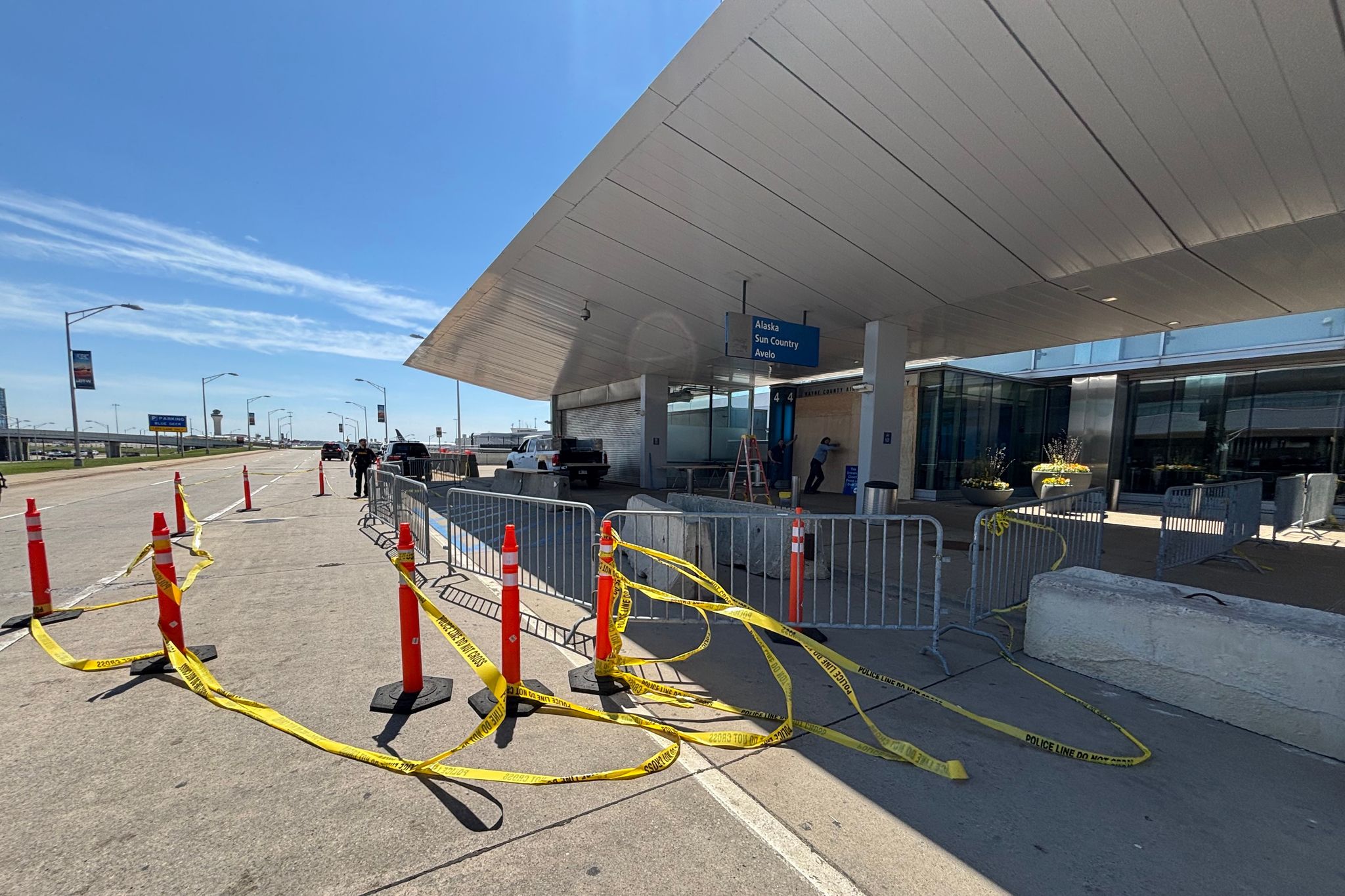 Car crashes into a passenger terminal at Detroit Metropolitan Airport ...