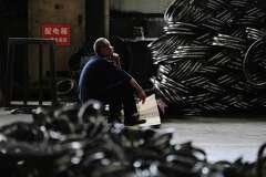 China’s factory activity slows in May, raising questions over its economy