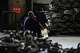 China’s factory activity slows in May, raising questions over its economy