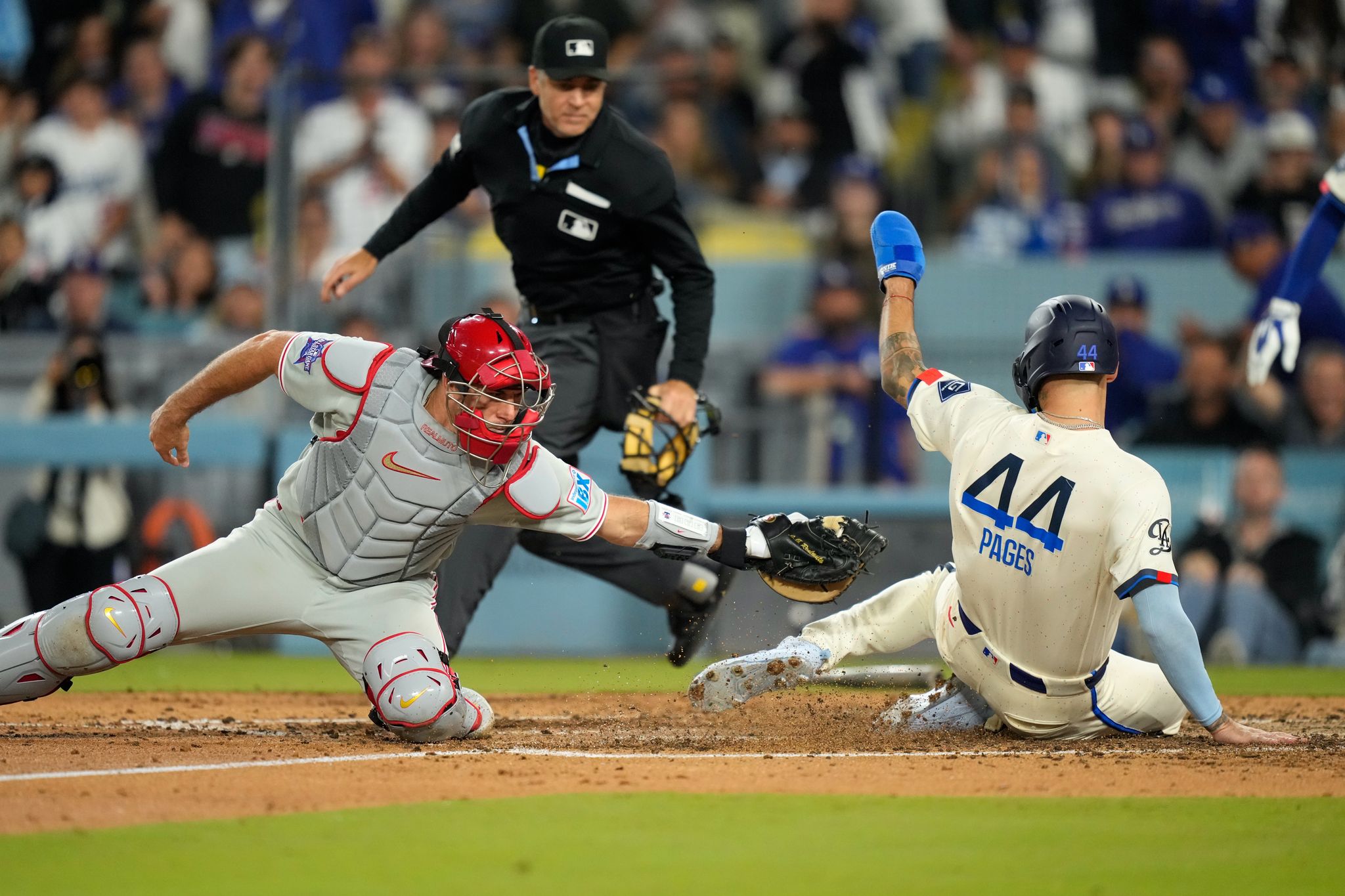 Phillies catcher J.T. Realmuto exits game vs. Dodgers with left wrist ...