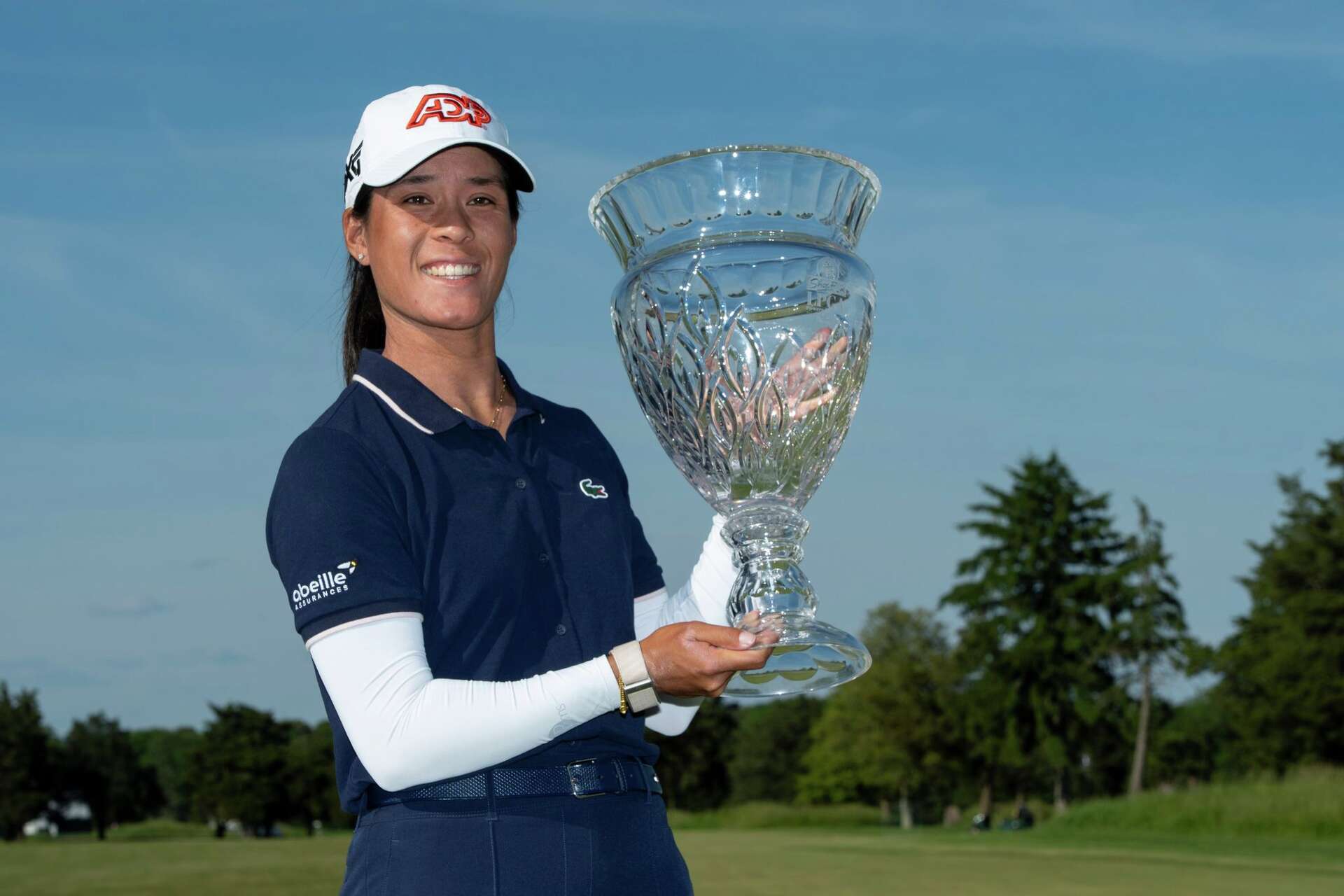 Russell Henley goes on late birdie run to win Colonial. Celine Boutier ...