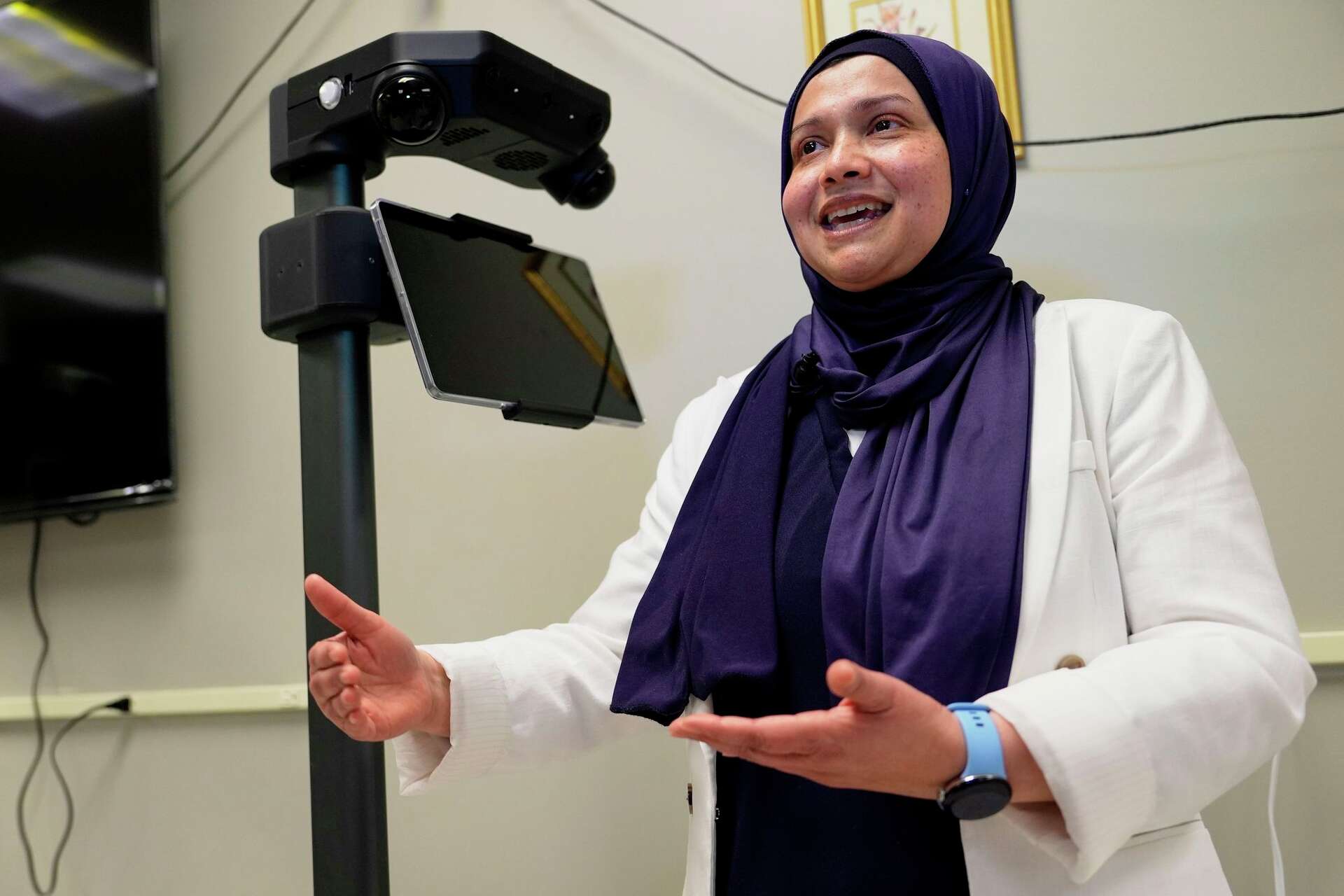 A robot is helping an ailing couple stay in their home. Are more to ...