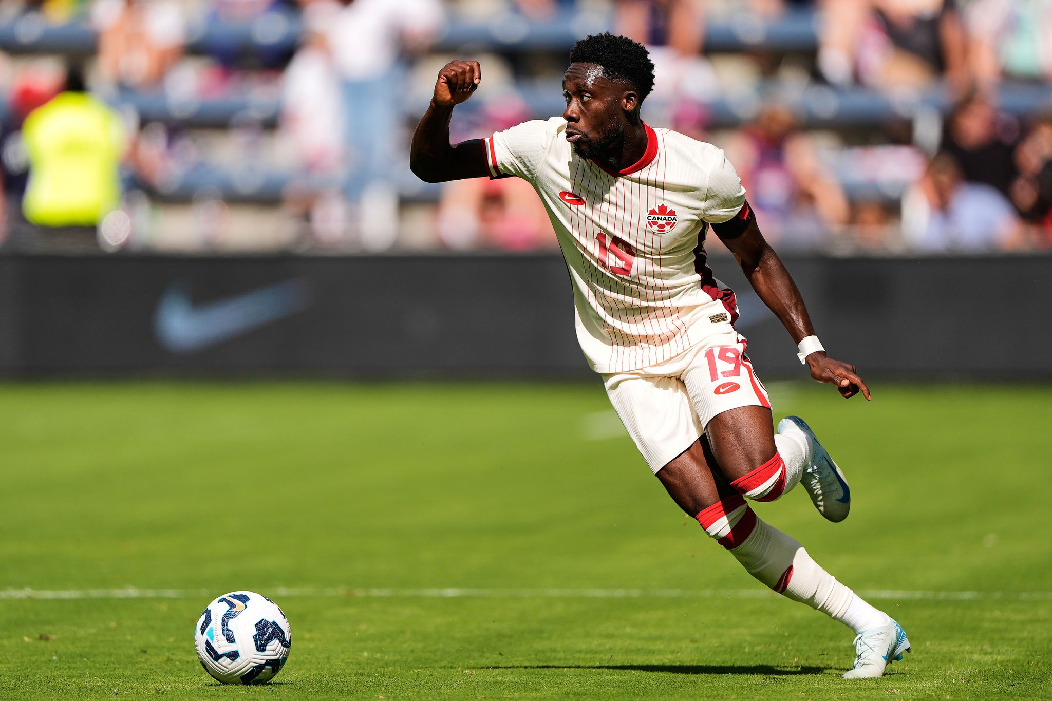 Injured Canada captain Alphonso Davies rejoins team but it's not clear ...