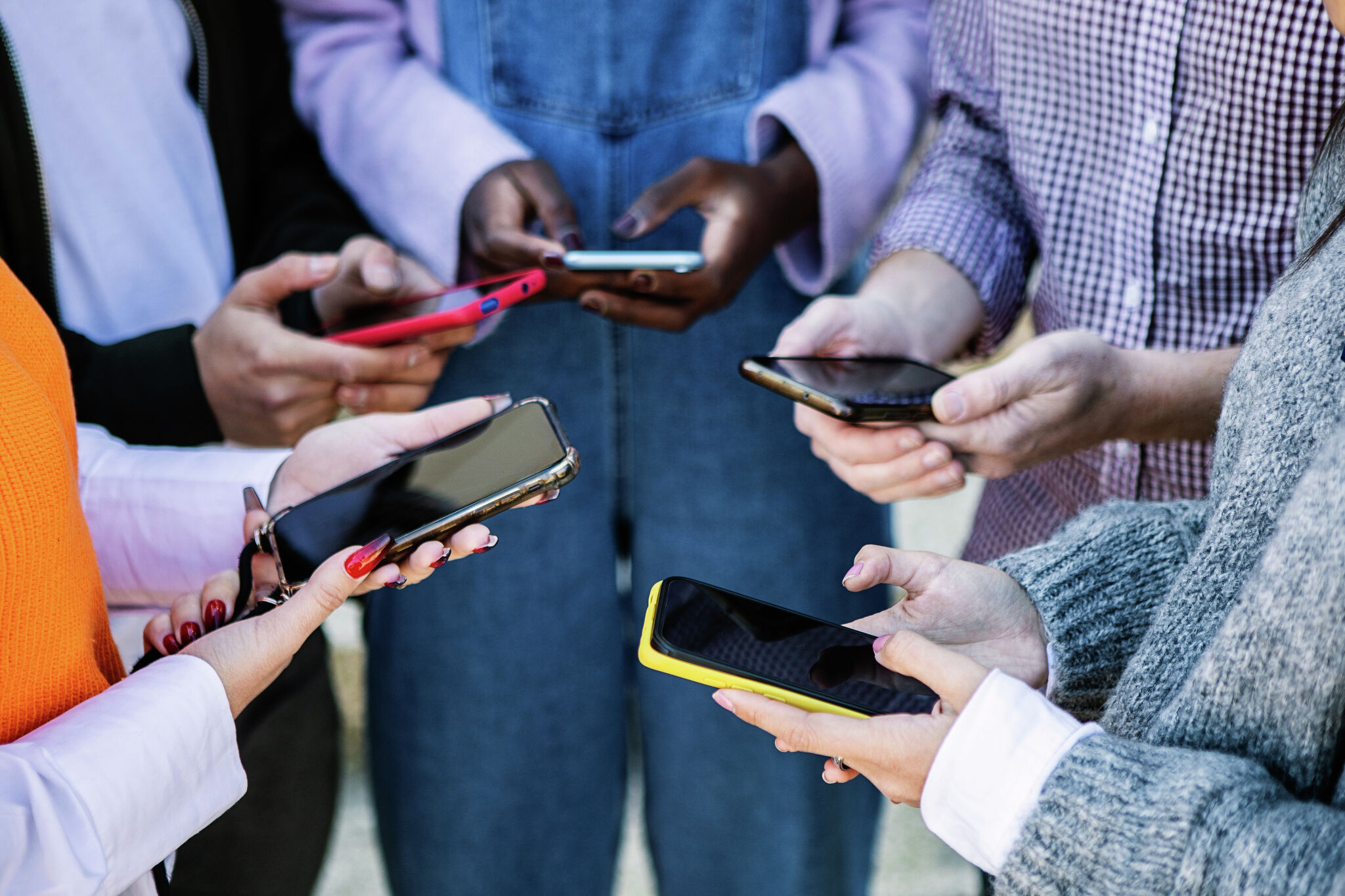 Cellphones replace calls with scrolling, texts and videos