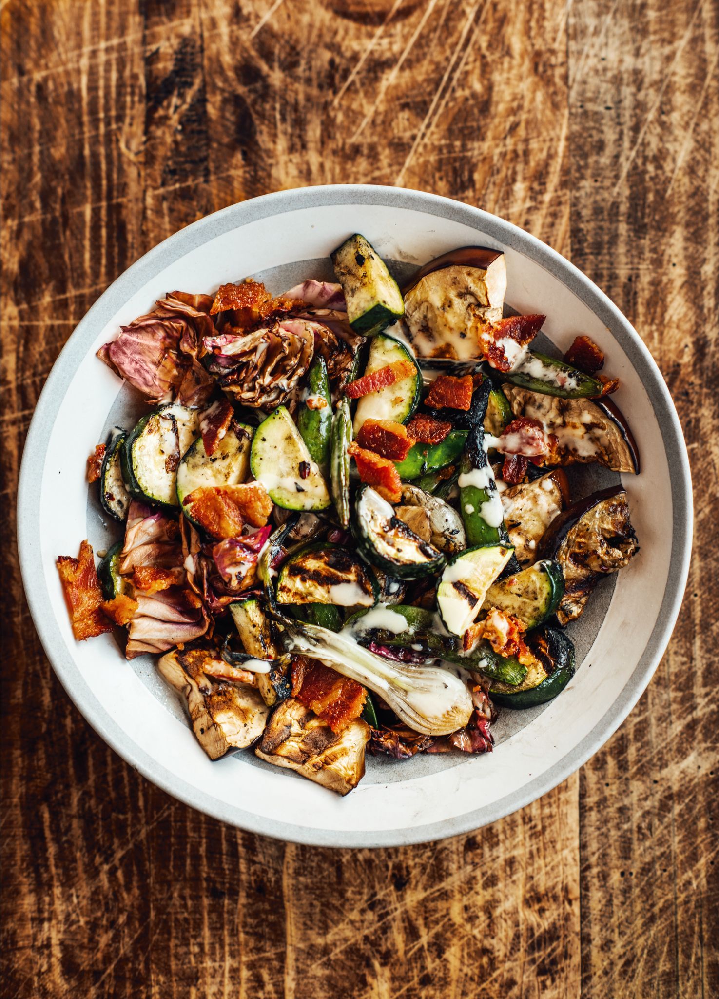 How to grill vegetables and toss them in Isaac Toups’ bacon vinaigrette