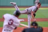 Orioles place Chris Bassitt on IL with back pain and recall Trey Gibson ...
