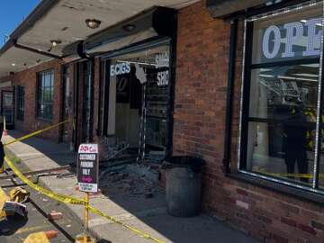 Car crashes into East Haven building on Foxon Road, officials say