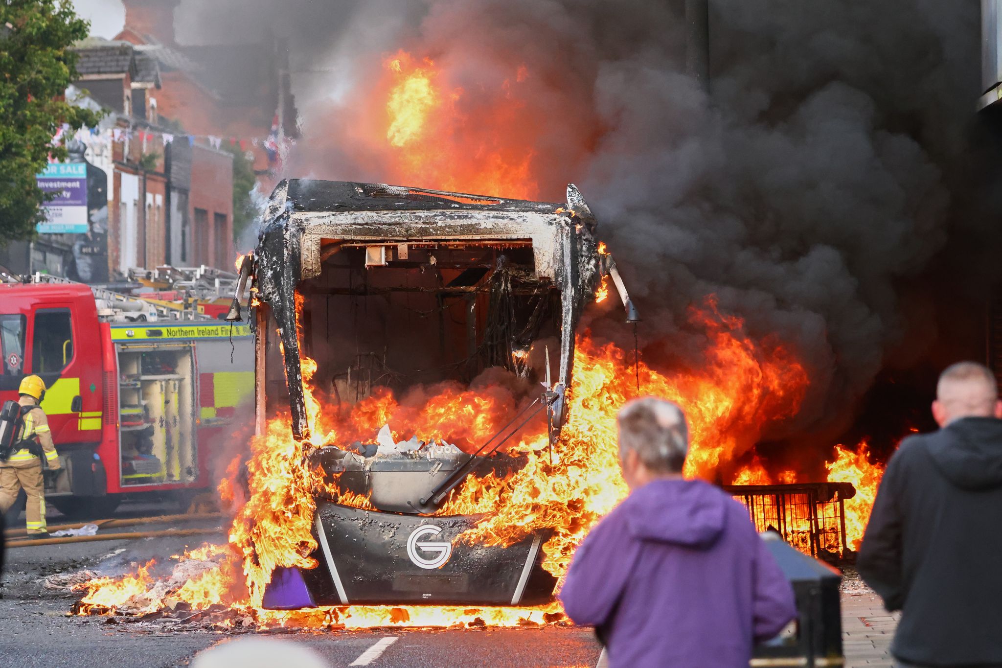 UK leaders call for calm as protests break out after Belfast street ...