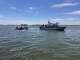 7 rescued after Clinton boat runs aground, officials say