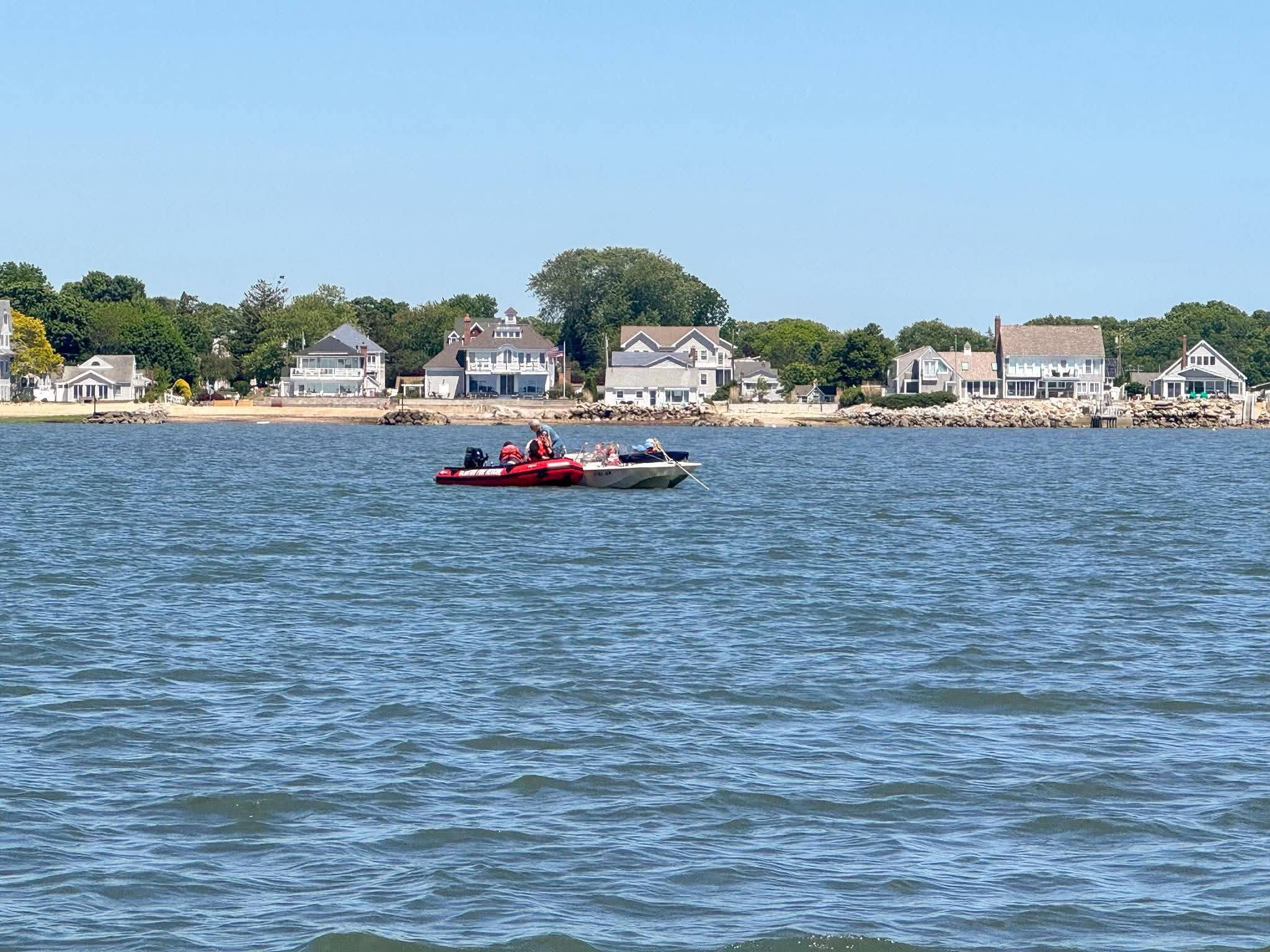 7 rescued after Clinton boat runs aground, officials say