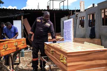Some burial societies in Africa now focus on helping the living, too
