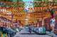 A street in The Hague is drenched in orange as Netherlands soccer fans ...