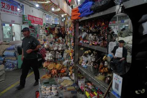 China touts Xinjiang at trade forum, spotlighting a region once marked ...