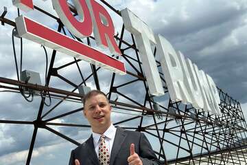 Can the man behind a giant pro-Trump sign ride the president’s praise ...