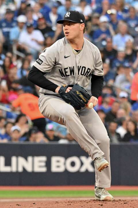 Okamoto and Springer homer to help the Blue Jays beat the Yankees 8-5