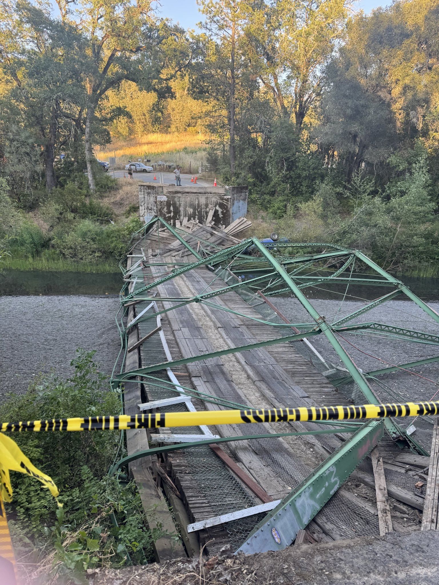 Calif. bridge collapses, drops car onto its roof near river below