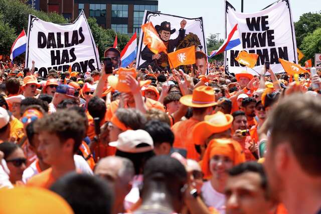Netherlands fans parade to Dallas Stadium before World Cup
