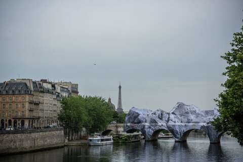 Monumental cave art on Paris' oldest bridge finally opens, as the ...