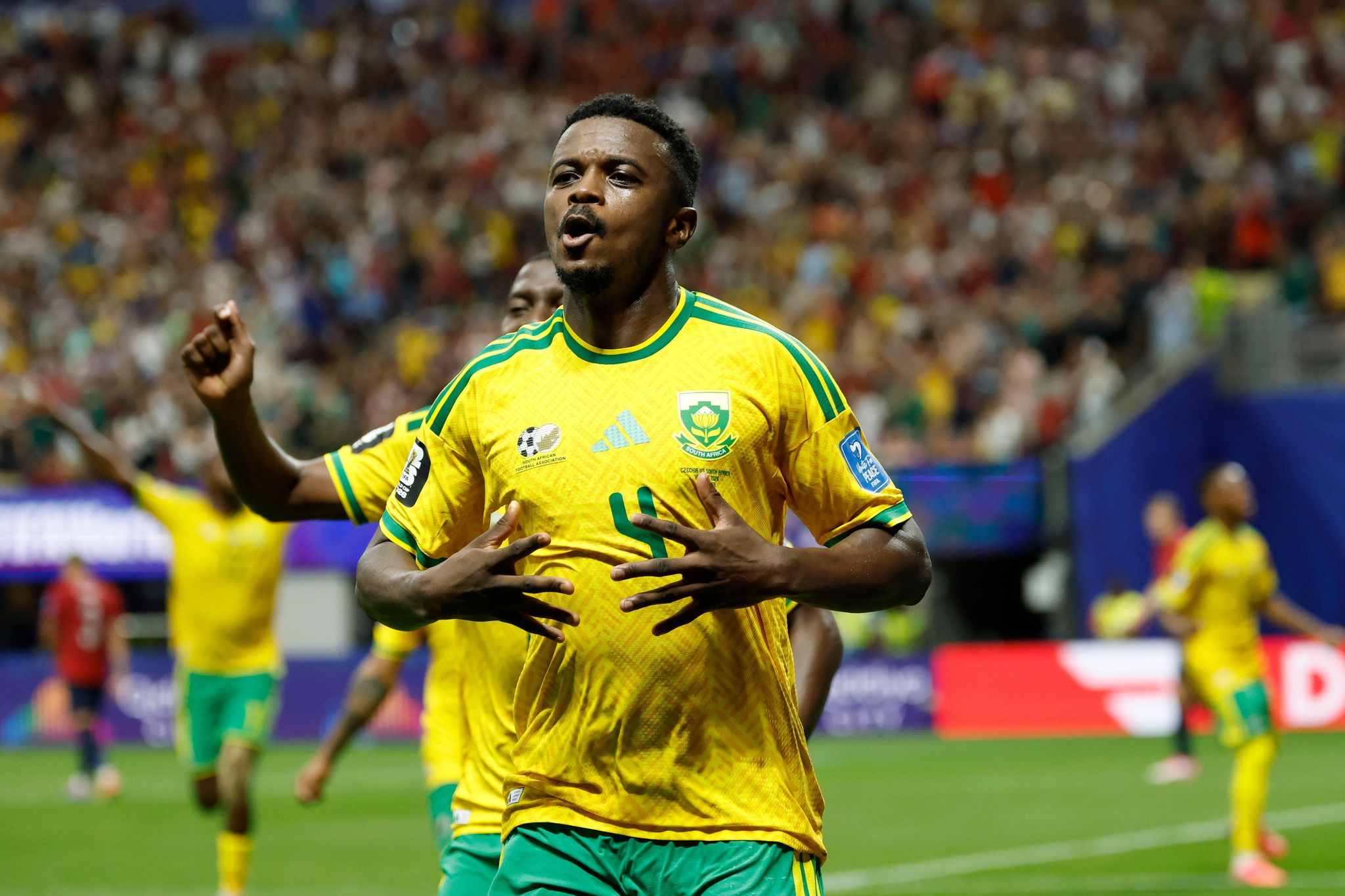 South Africa keeps its World Cup hopes alive with a 1-1 draw against ...