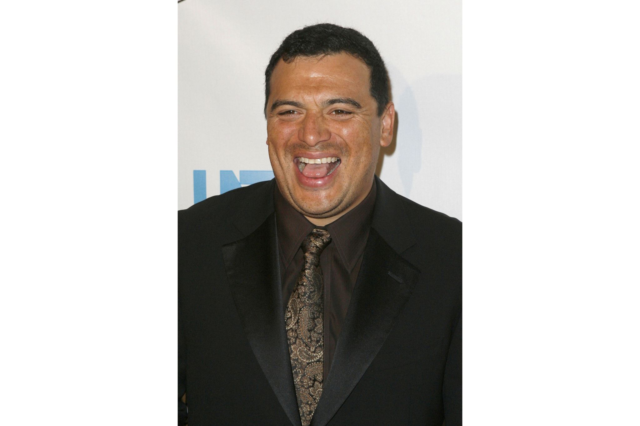 Comedian Carlos Mencia faces 12 felony charges for failing to report ...