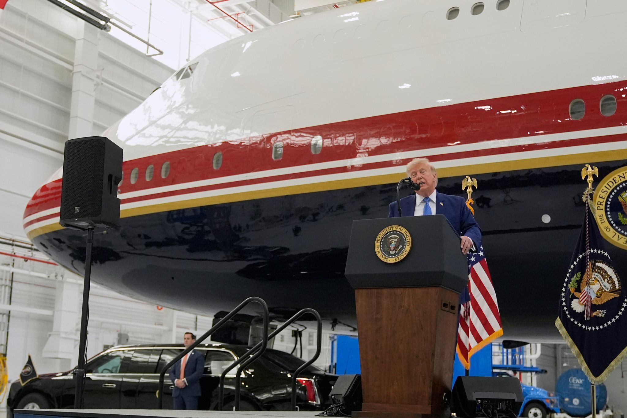 President Donald Trump unveils the new Air Force One, a converted ...