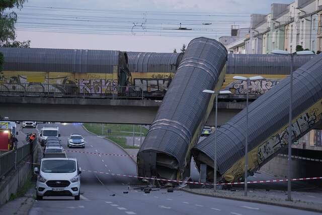 Freight trains' collision in Germany sends 2 wagons plunging off a ...