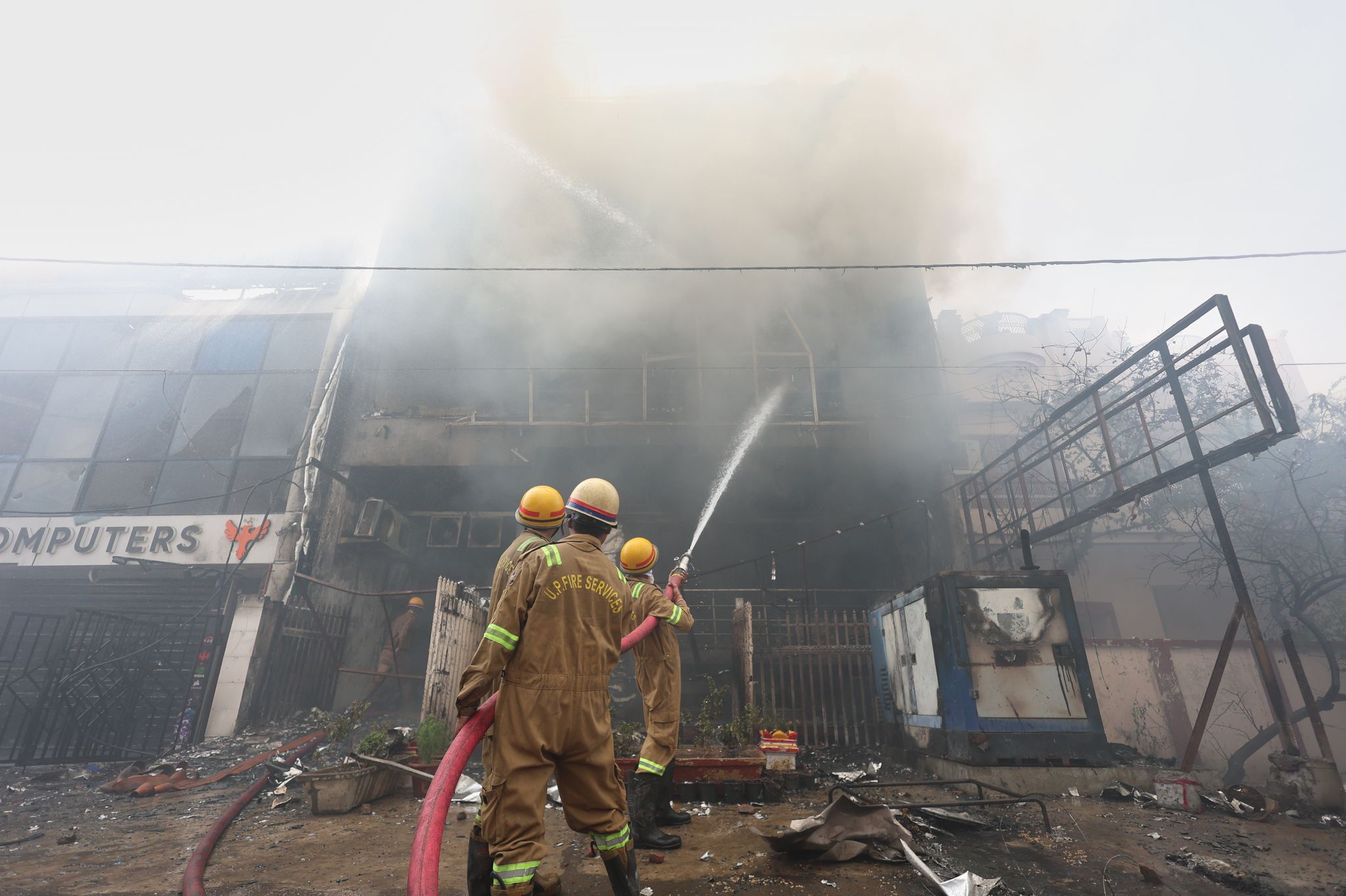Fire tears through building in northern India, killing 14, mostly students