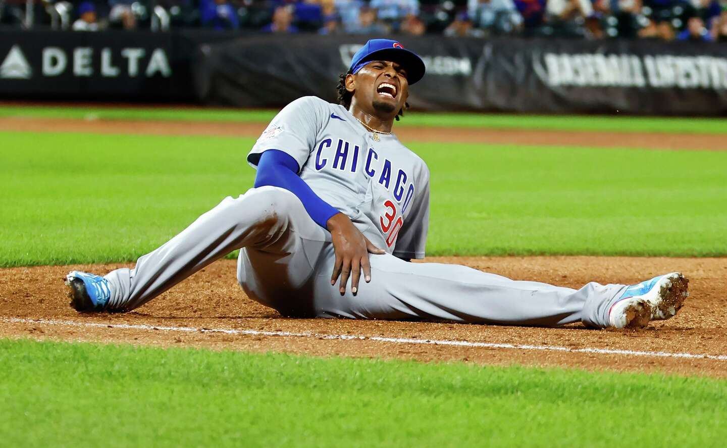 Cubs pitcher Edward Cabrera carted off the field with a left leg injury