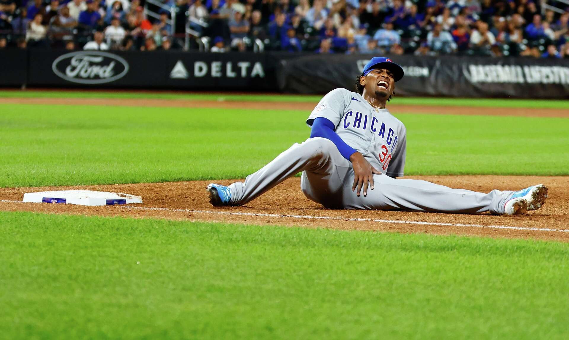 Cubs pitcher Edward Cabrera carted off the field with a left leg injury