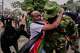 Kenyans mark anniversary of bloody protests as police block roads