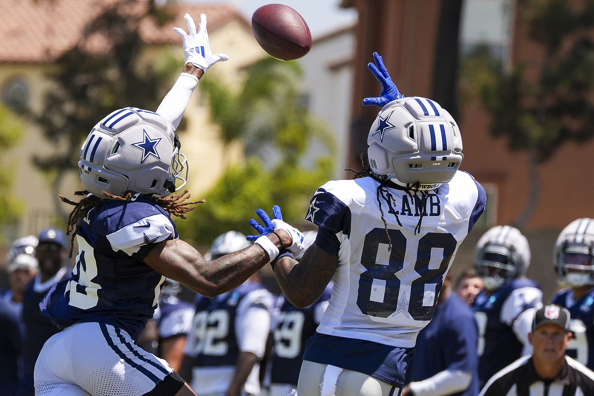 Carter beats the heat at first practice, defense could be dominant
